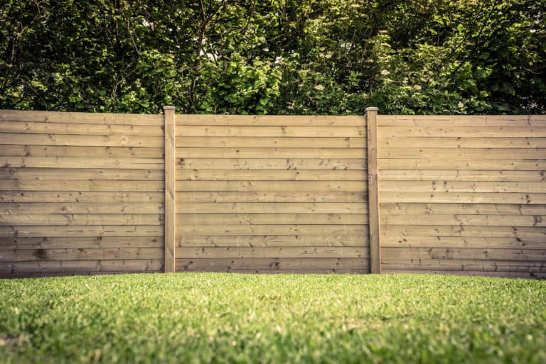 Who REALLY Owns the Fence on a Property Line? – Fence Frenzy